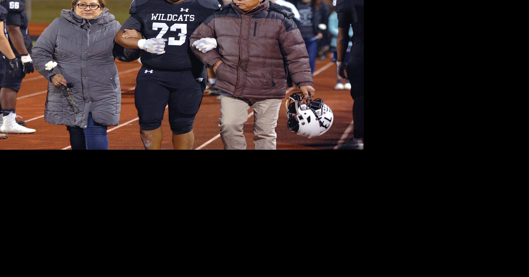 Photos: Normal West football team fights off the cold and Peoria Manual