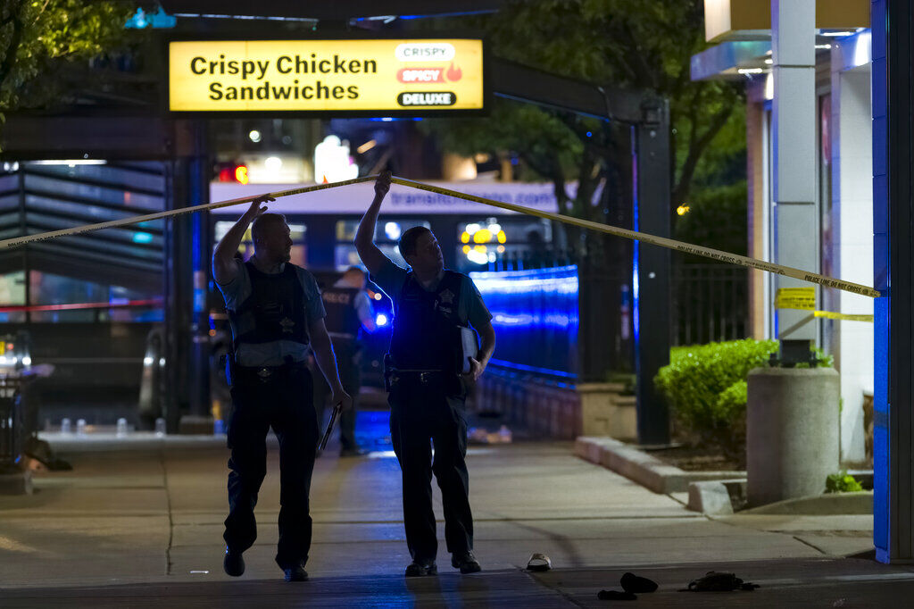 Two men charged in fatal Chicago shopping district shooting