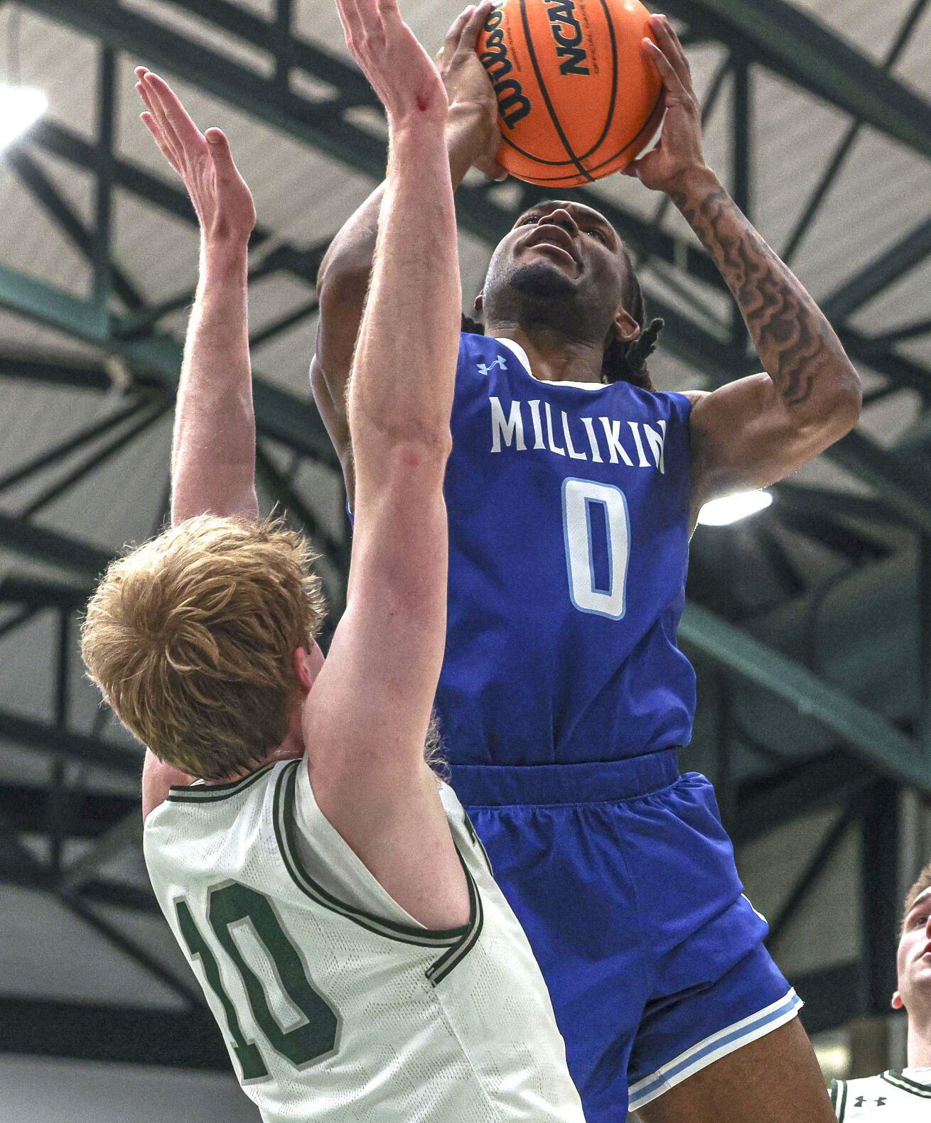 Illinois Wesleyan frees Freeman, proceeds past Millikin