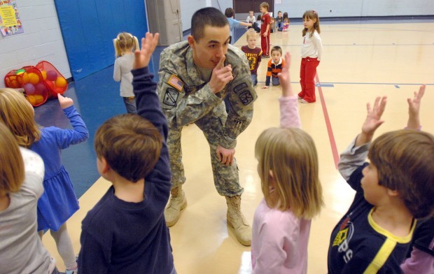 ROTC students spend time with elementary kids