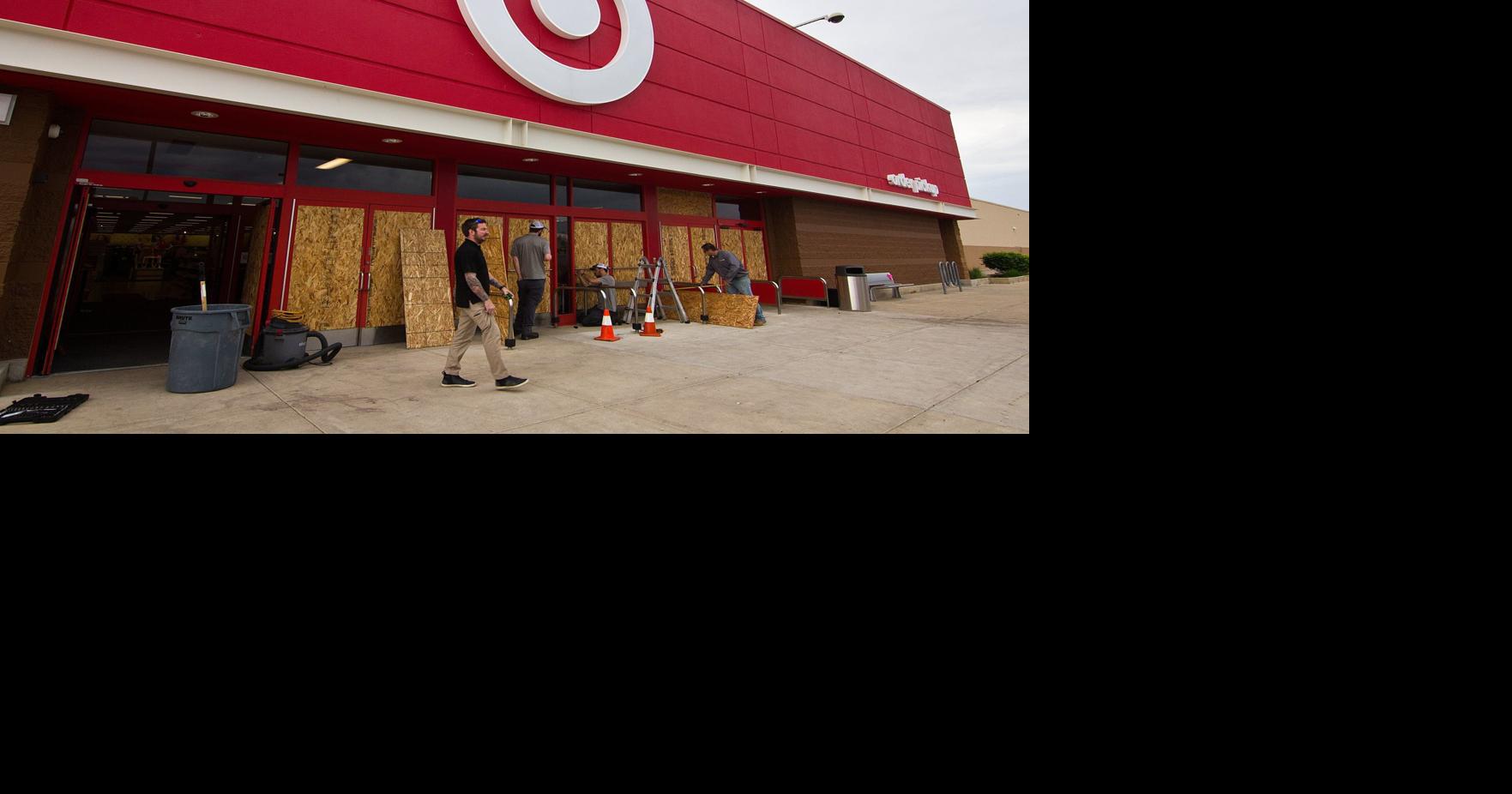 Normal police release 8 photos of Target looting suspects