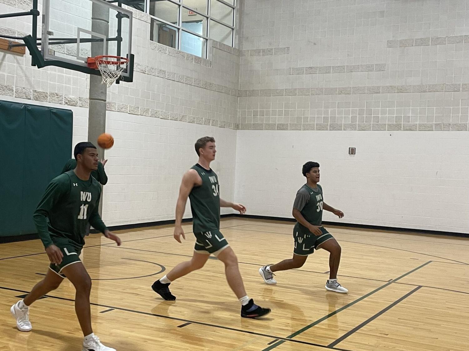 Illinois Wesleyan basketball teams bound for Europe
