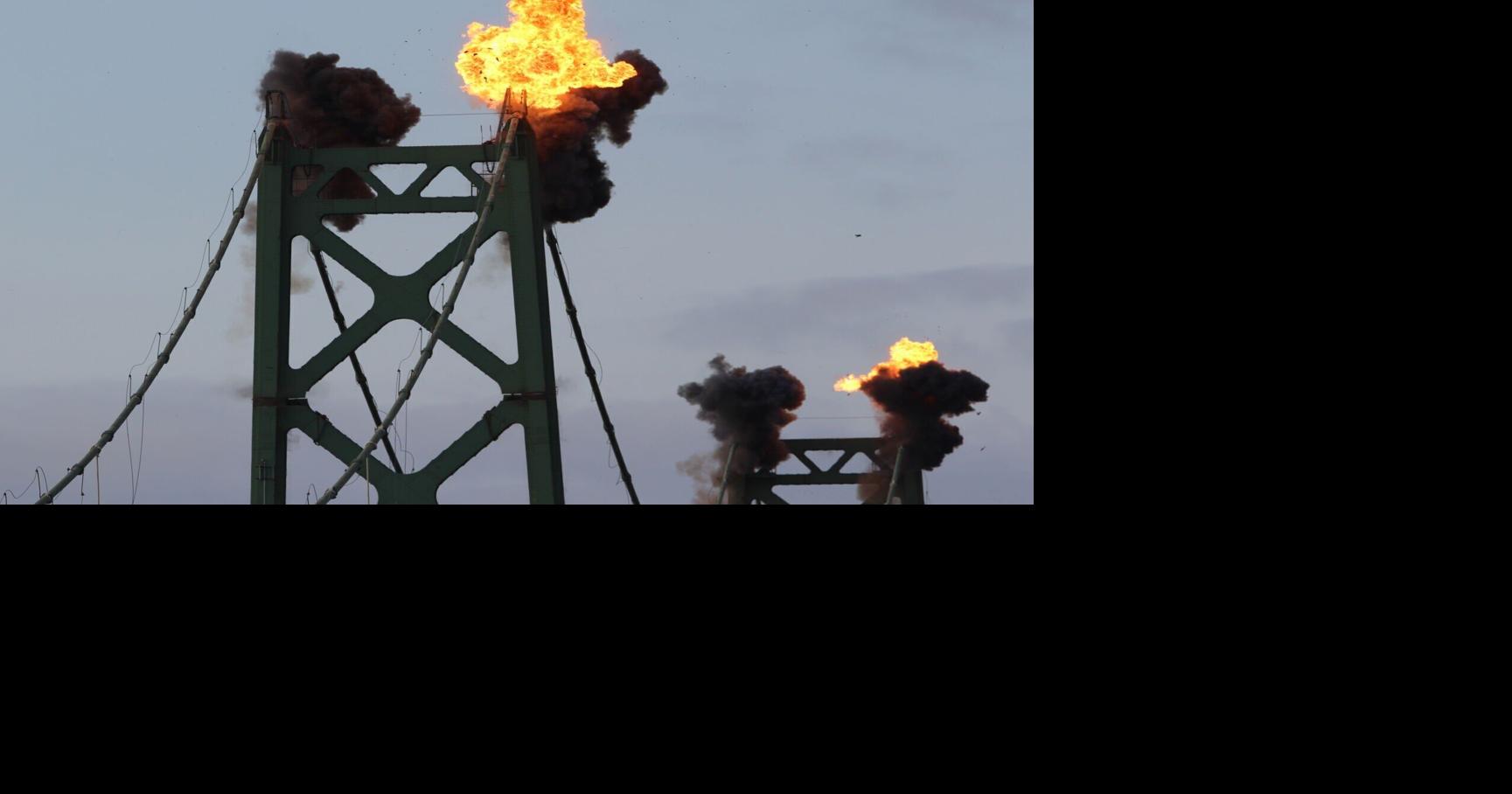 Contractor demolishes old I-74 bridge with explosives