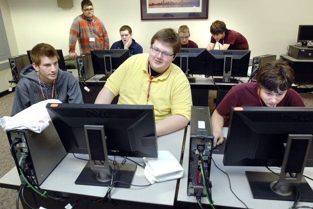 High schoolers go up against hackers at cyber defense competition
