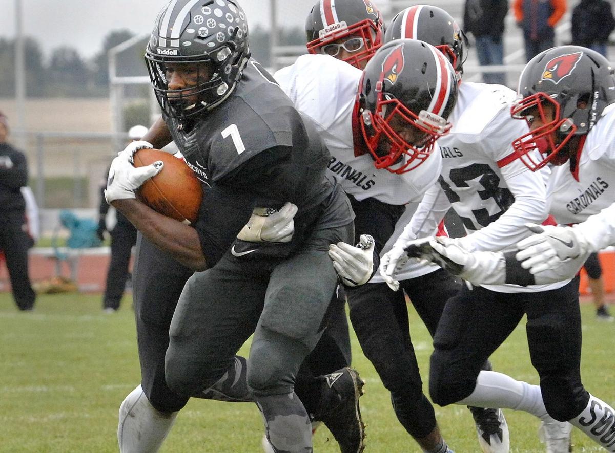 Photos: Normal West advances in football playoffs against Blue Island ...