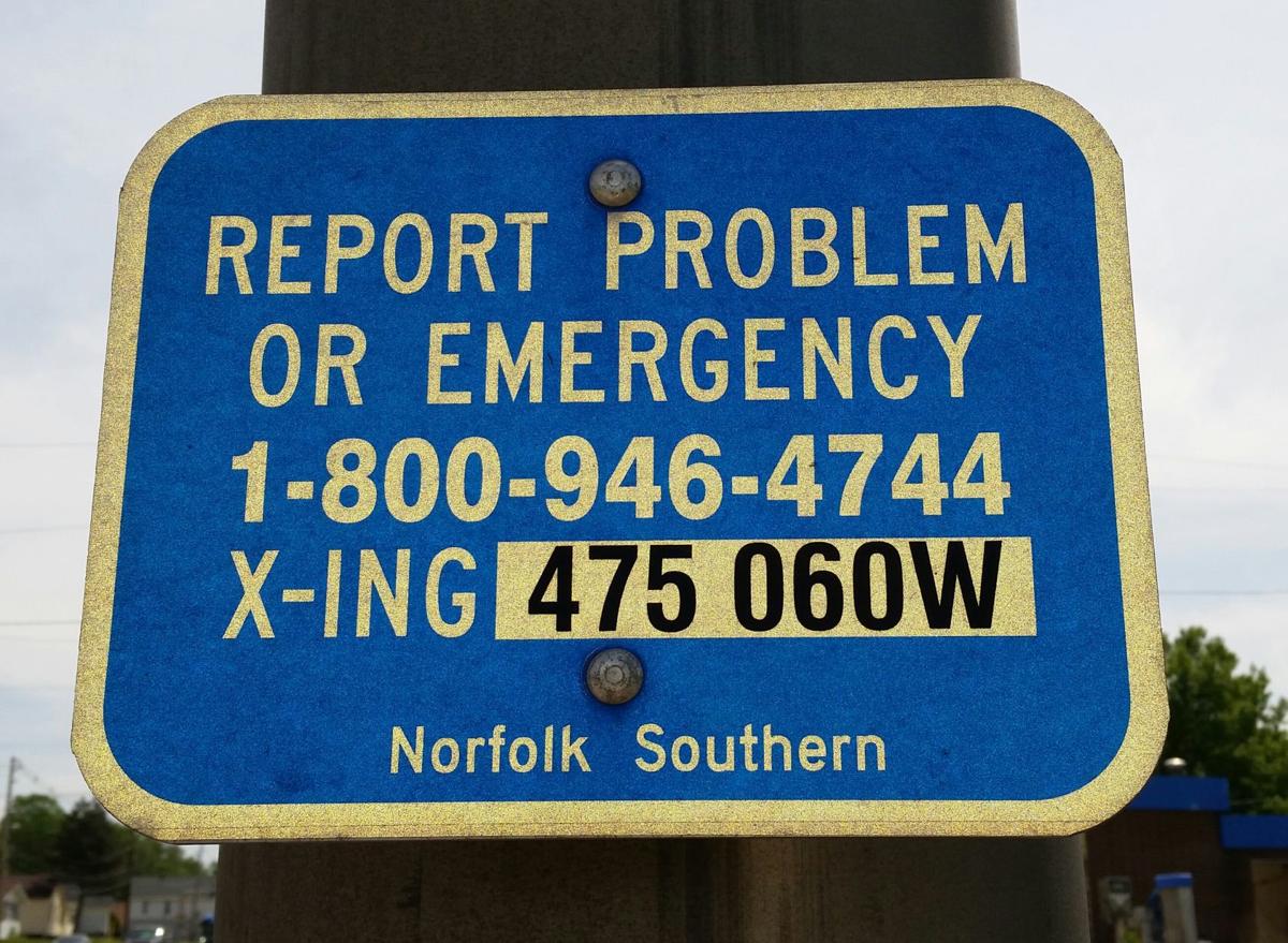 What should you do if your car gets stuck on the RR tracks?