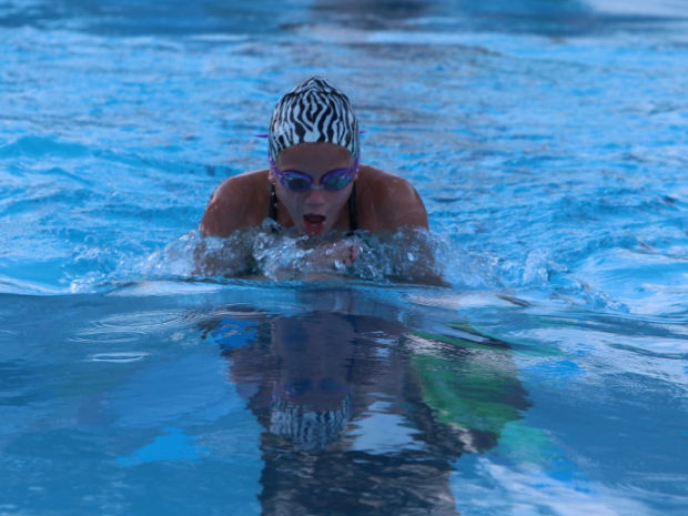 Swim team finishes regular season with two dual wins