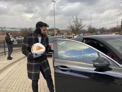 TikTok star Ismail Taher helps give away 360 turkeys in suburban Chicago