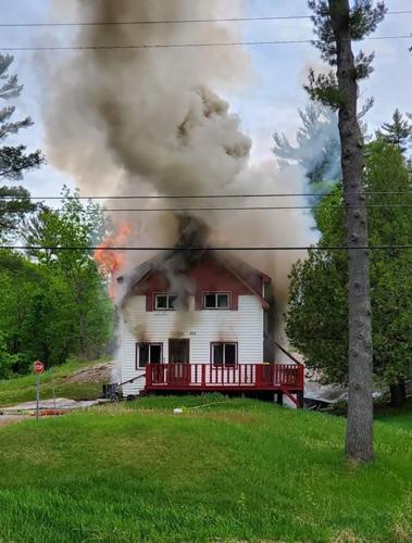 McDougall home gutted by flames June 1 as unrelated manhunt underway