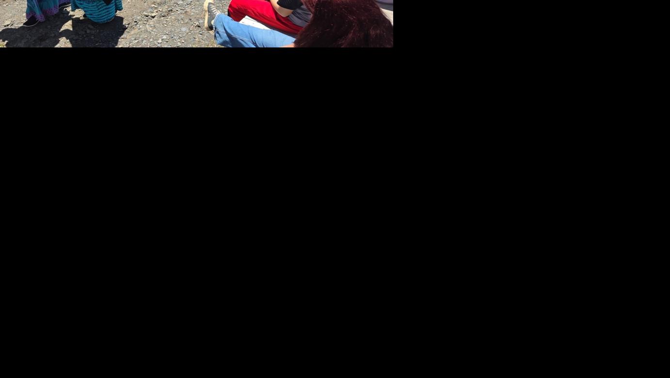Wasauksing students and their birch bark canoe build