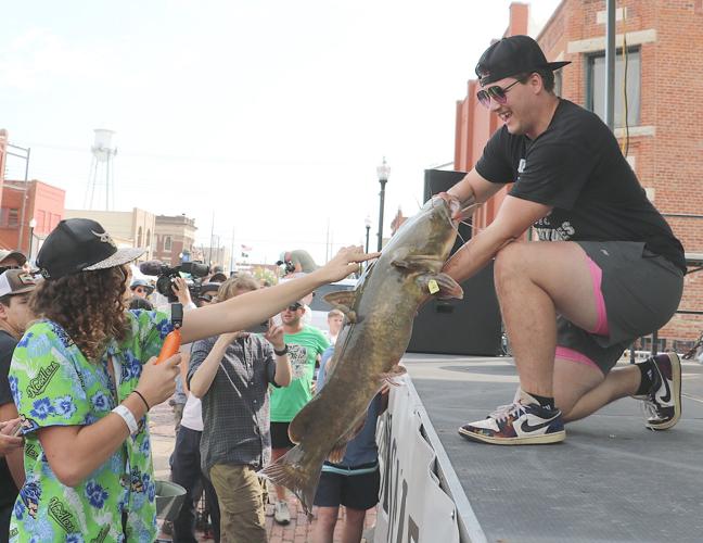 Big fish, pooches team up for noodling | Local News ...