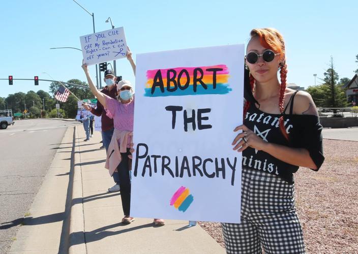 March for reproductive rights draws crowd to Beeline Highway ...