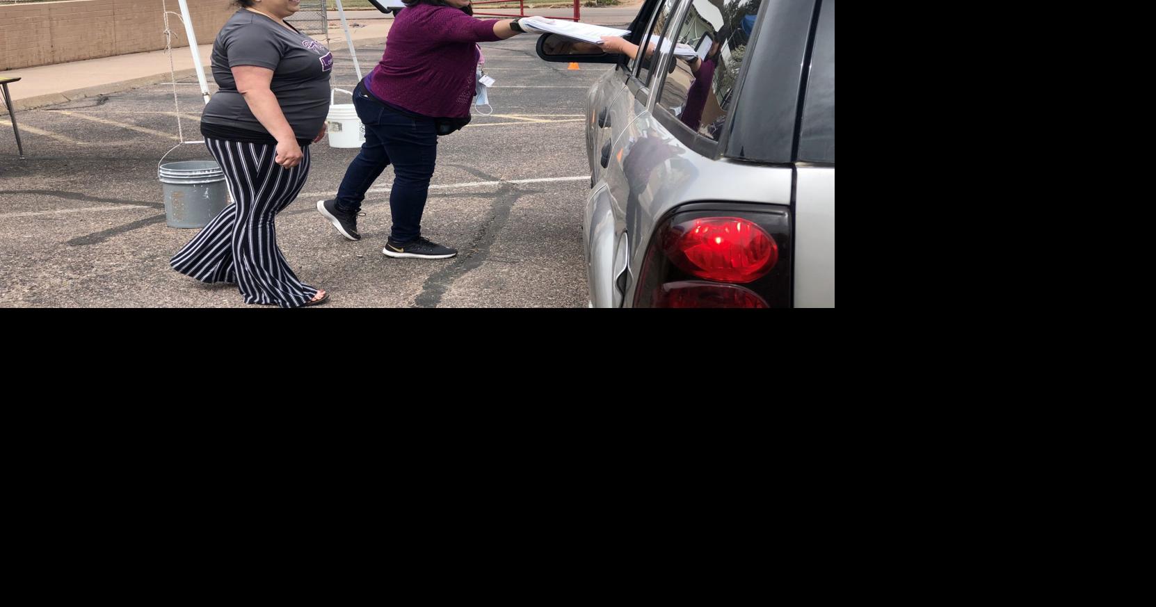 Schools hand out packets, go online to keep students learning | Covid ...