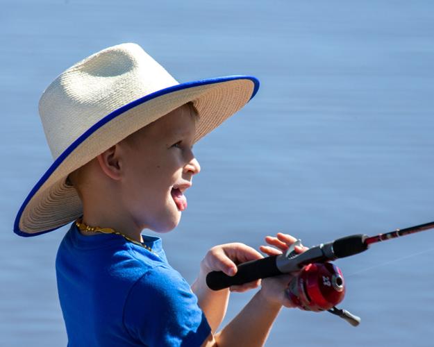 Kids Fishing Festival gets hundreds of kids hooked on fishing | Local ...