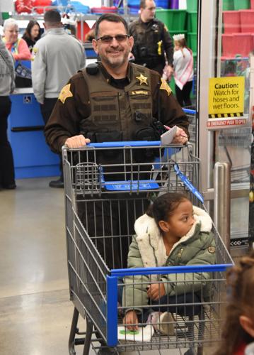 Cops and Kids hit the toy aisle | News | pdclarion.com