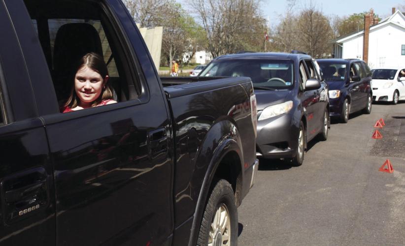 Students pick up belongings at a safe distance | The Eastern Graphic ...