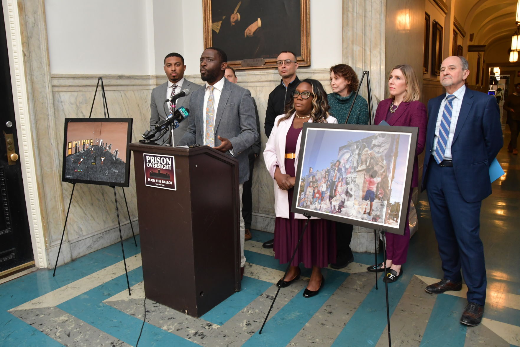 Prison reform advocates rally at City Hall in support of ballot ...
