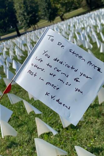 COVID flags are no longer flying, although families’ grief remains ...