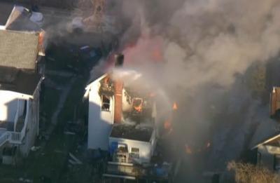 2 officers are wounded by gunfire at a suburban Philadelphia home that ...