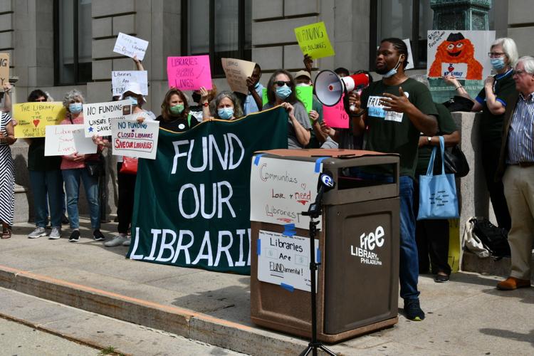 Free Library supporters protest, demand $15M budget increase | Local ...