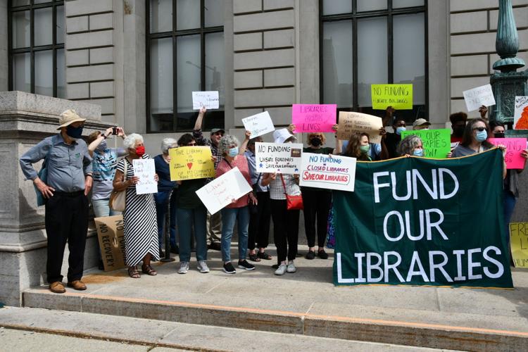 Free Library supporters protest, demand $15M budget increase | Local ...