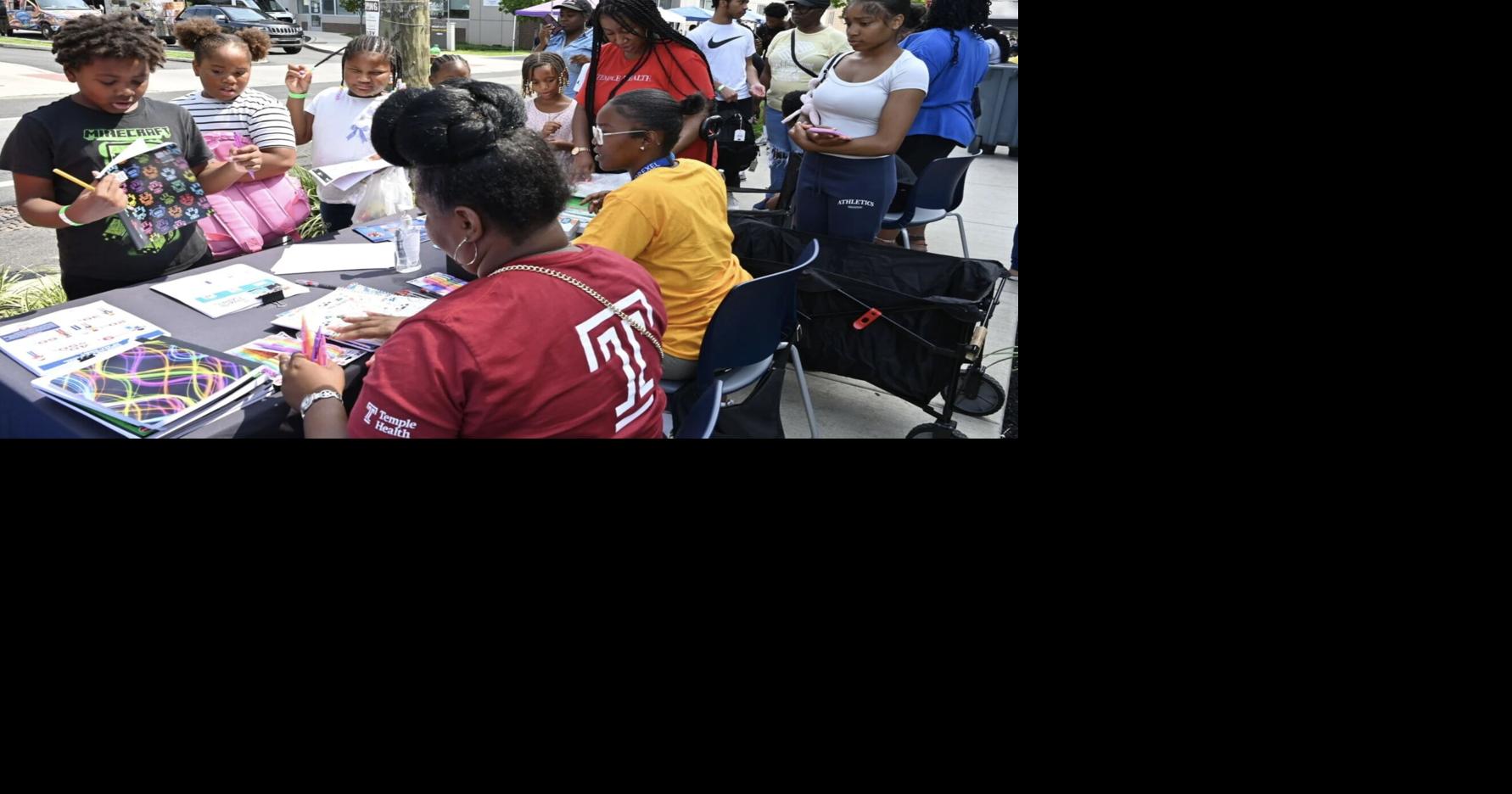 PHA's back-to-school event provides 1,500 bookbags | Local News ...