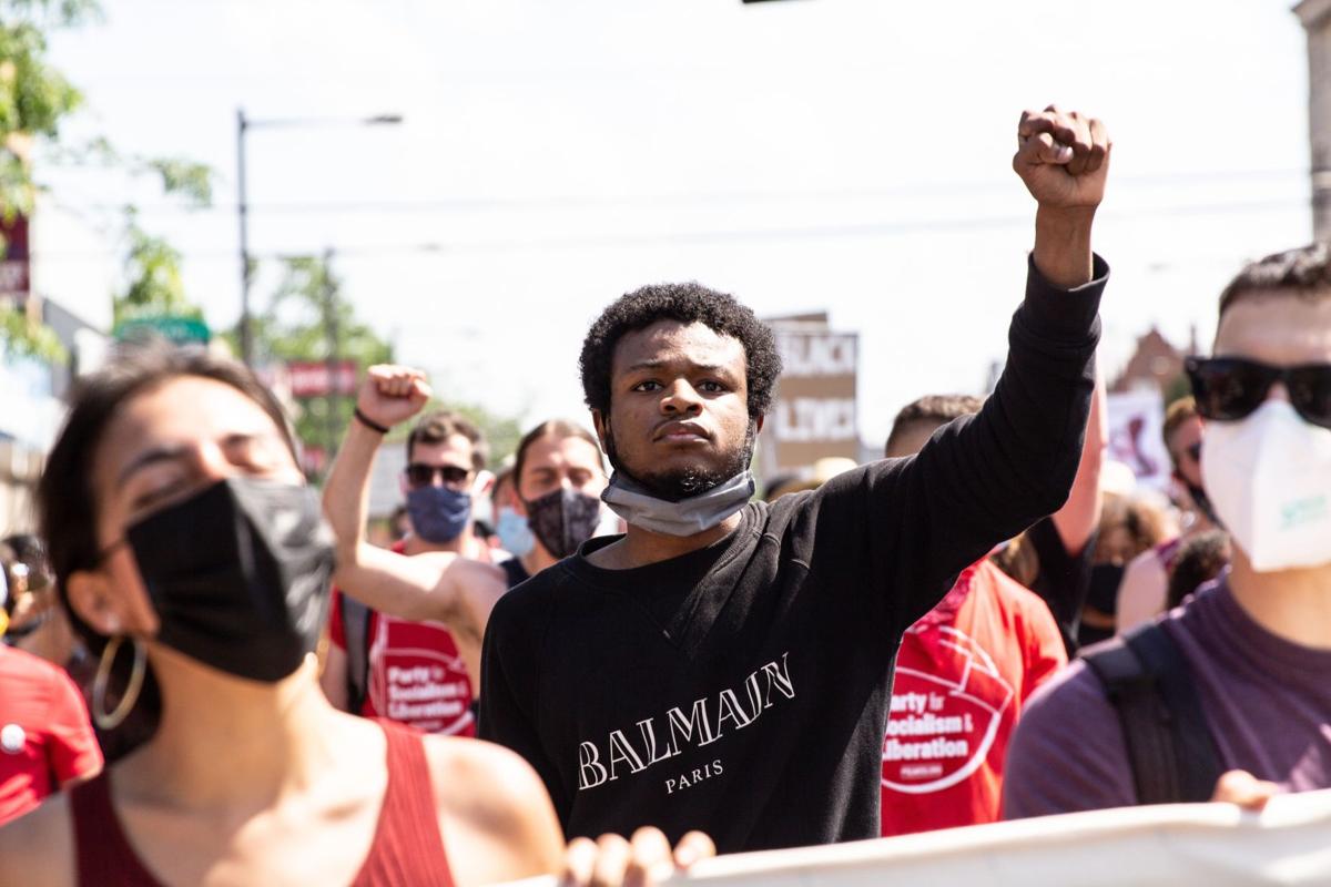Protesters call on City Council to defund the police, stage sit-in in ...