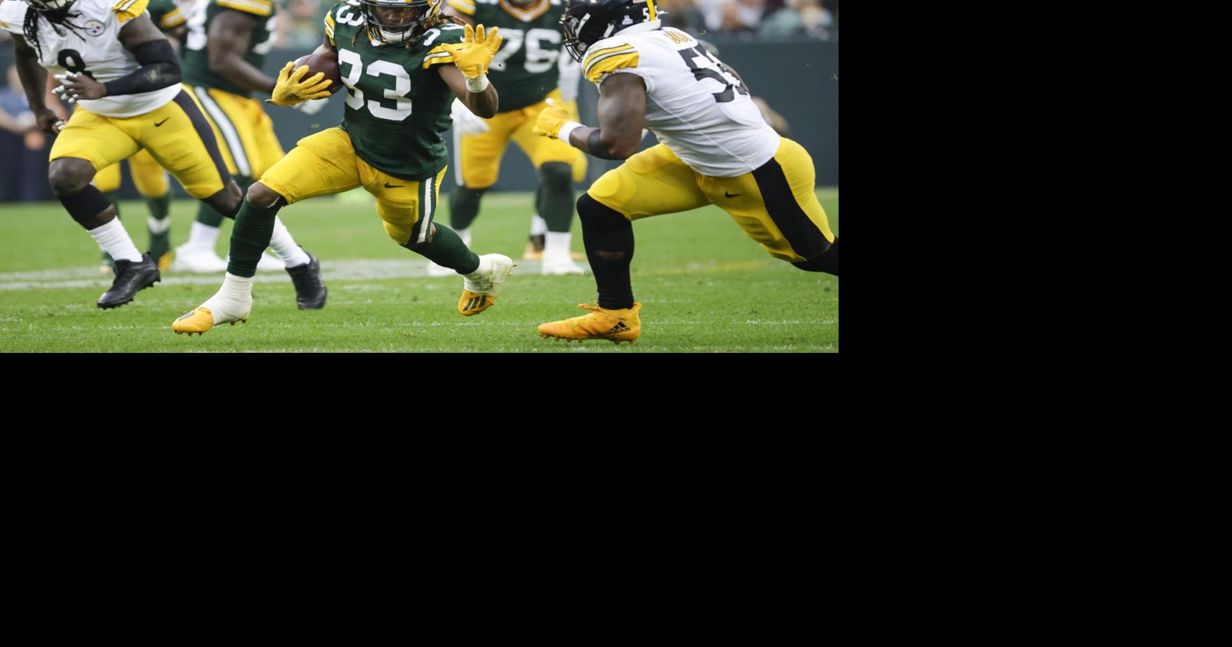 Packers add pocket to Aaron Jones' jersey so he can play while carrying ...