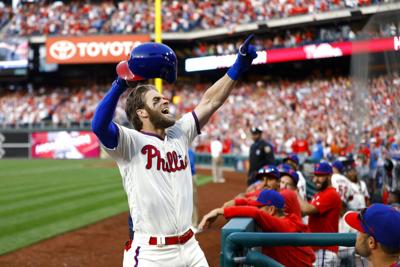 Harper homers, hears "MVP!" chants as Phillies beat Braves | Baseball ...