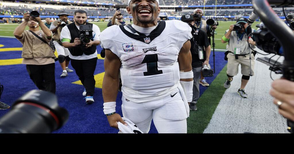 Jalen Hurts and a tough defense carry the Eagles to a 23-14 victory ...