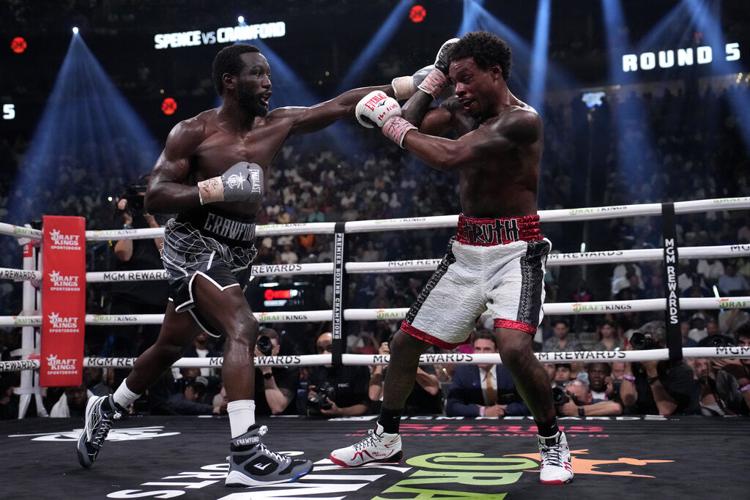 Crawford unifies welterweight division with 9th-round TKO in dominant performance over Spence ...