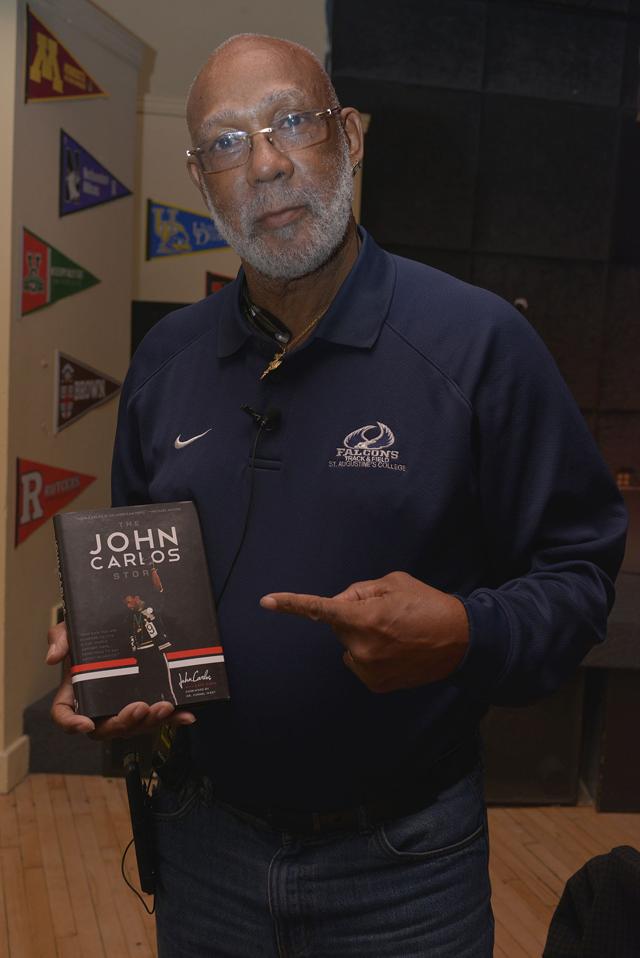 John Carlos, famous for 'Black Power Salute' in '68 Olympics, holds ...