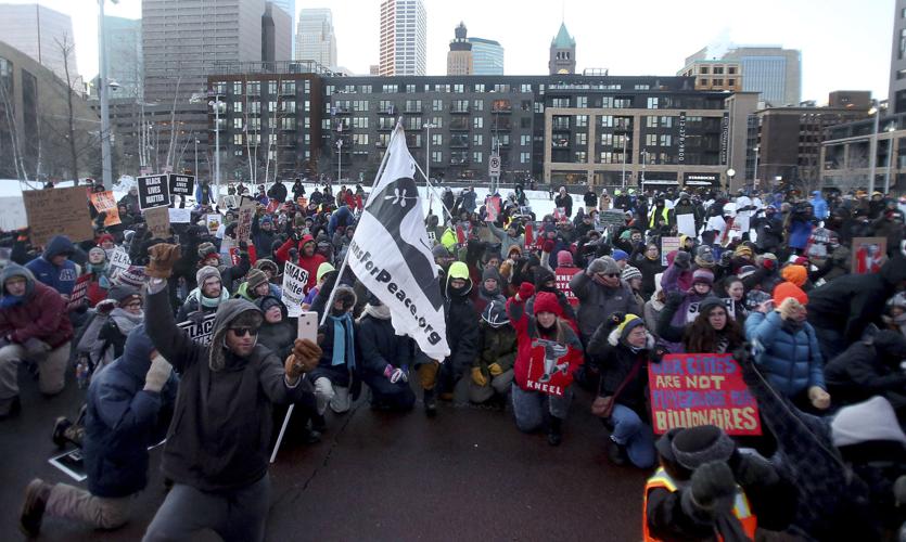 Black Lives Matter protesters block trains near Super Bowl, march on ...