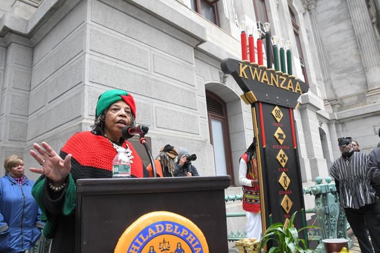 Philadelphia lights first official kinara for start of Kwanzaa ...