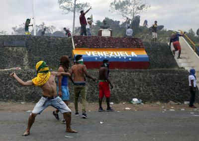 Venezuela standoff turns deadly as troops block aid delivery | News ...
