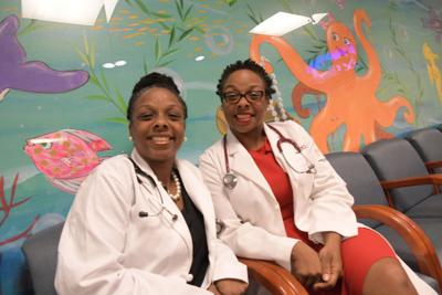 Twin physicians strive to make a difference | News | phillytrib.com