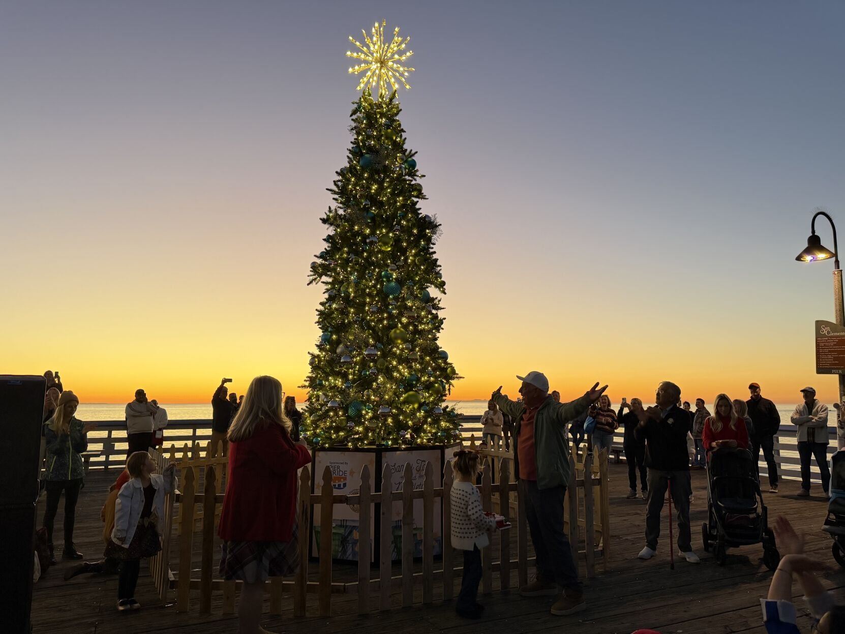 Community Gathers for PierPride’s Tree Lighting at San Clemente Pier ...