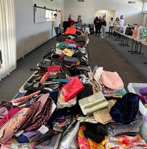 Local Woman’s Club Collects over 200 Handbags for Charity ...