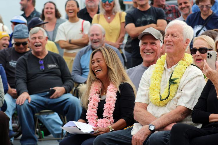 Soaring Statues: Tandem Surfers Immortalized at Watermen’s Plaza ...
