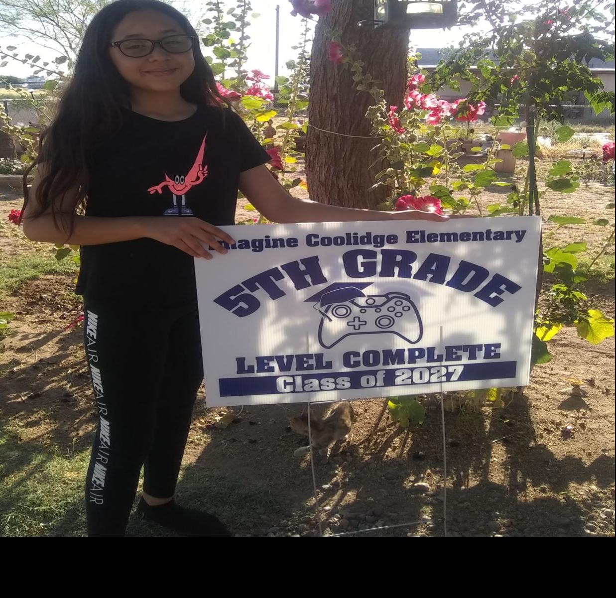 Imagine Elementary teachers recognize promoting students with yard ...