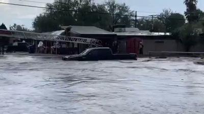 Video: Tucson firefighters rescue stranded motorists in flooded streets ...