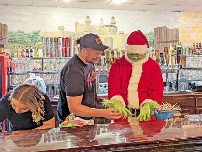 Grinch makes appearance at Pizza Pub | Pine City Pioneer ...