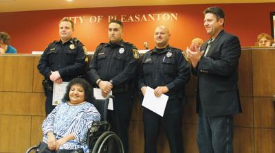 Police assist handicapped woman across busy road | News ...