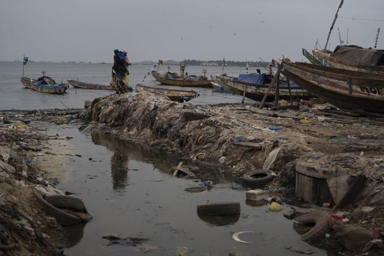 AP PHOTOS: 'Plastic Man' in Senegal on mission against trash | Smart ...