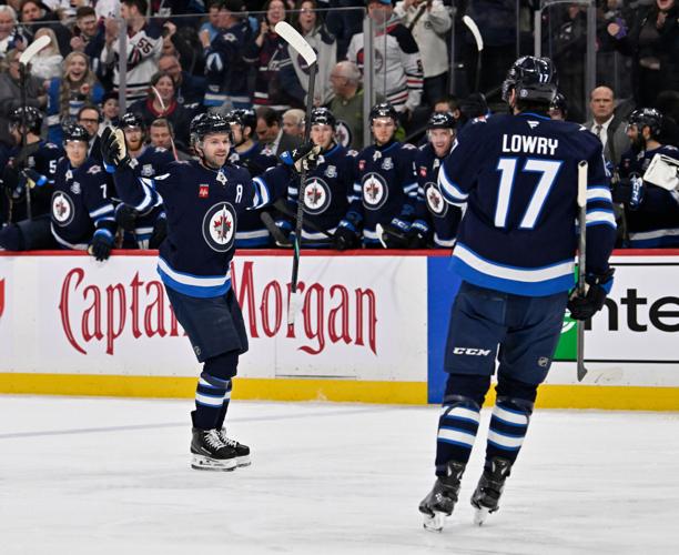 Lowry, Connor each have goal and assist as Jets beat Islanders 5-4 for ...
