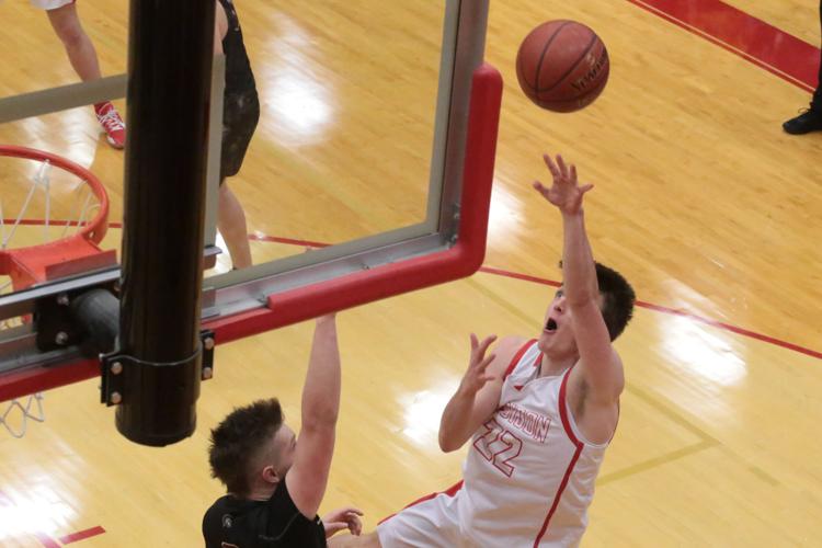 BOYS BASKETBALL: Madison advances to district title game with win over ...