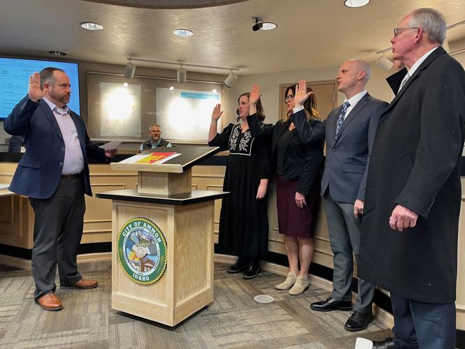 Ammon City Council swears in new council members, approves application ...