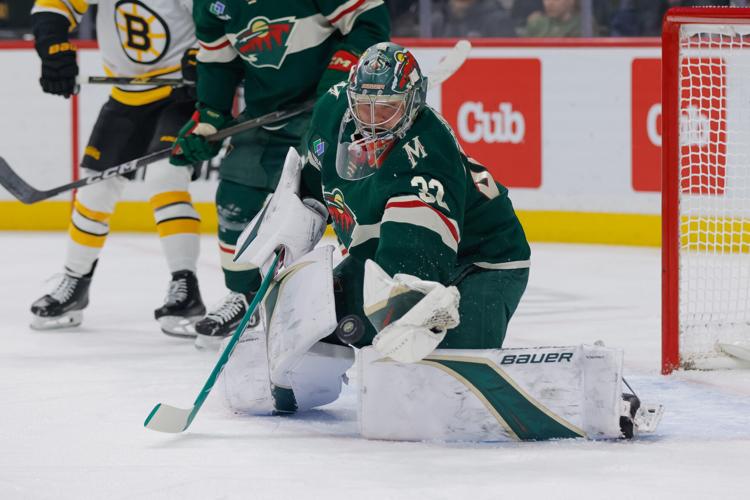 Quinn Hughes scores in Minnesota debut as Wild beat Bruins 6-2 for 4th ...