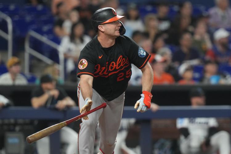 Marlins beat the Orioles 4-3 on a 9th-inning throwing error to avoid ...