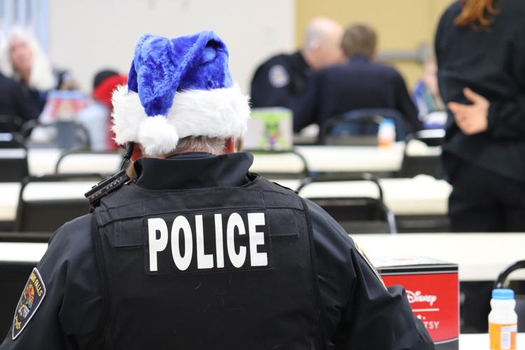 Annual ‘Shop with a Cop’ takes 31 children out Christmas shopping ...